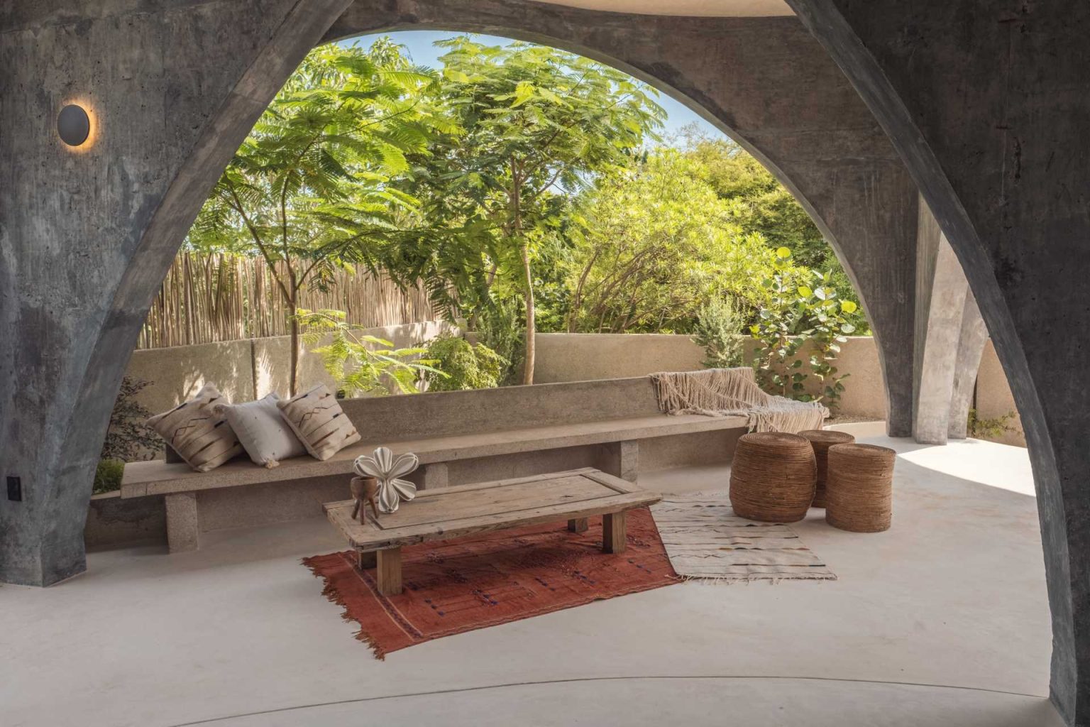 A Round Design And Open Arches Give This Concrete Home A Unique Look
