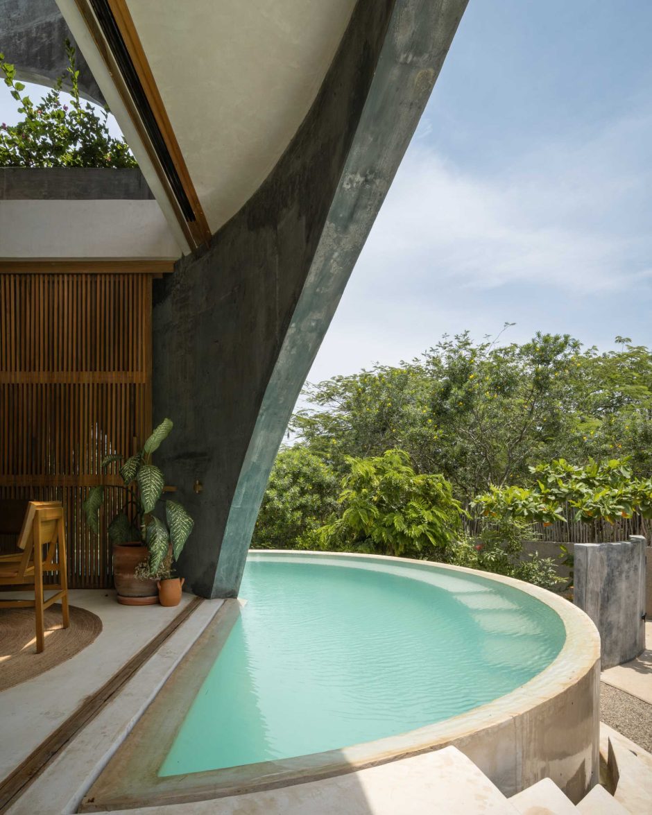 A Round Design And Open Arches Give This Concrete Home A Unique Look