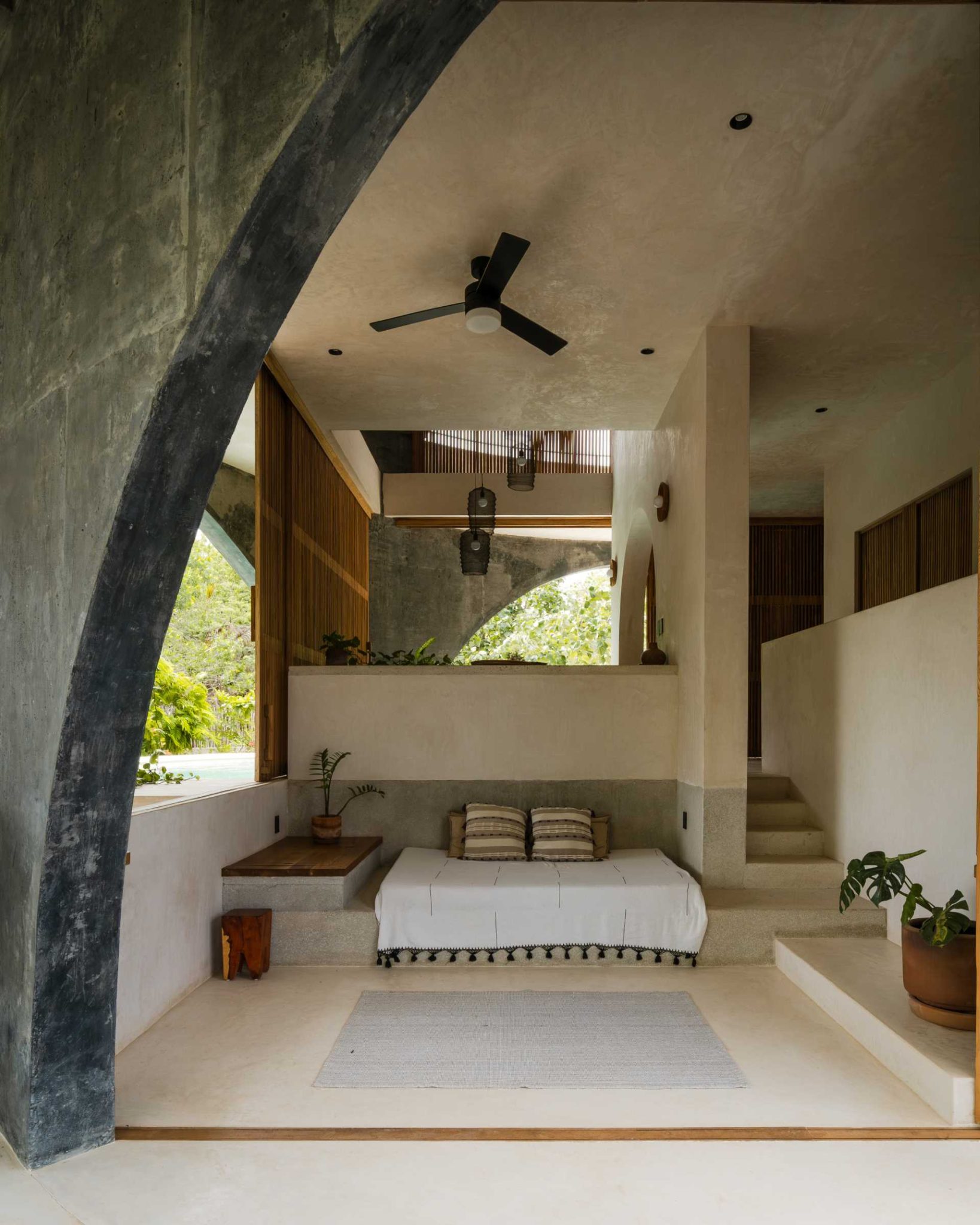 A Round Design And Open Arches Give This Concrete Home A Unique Look