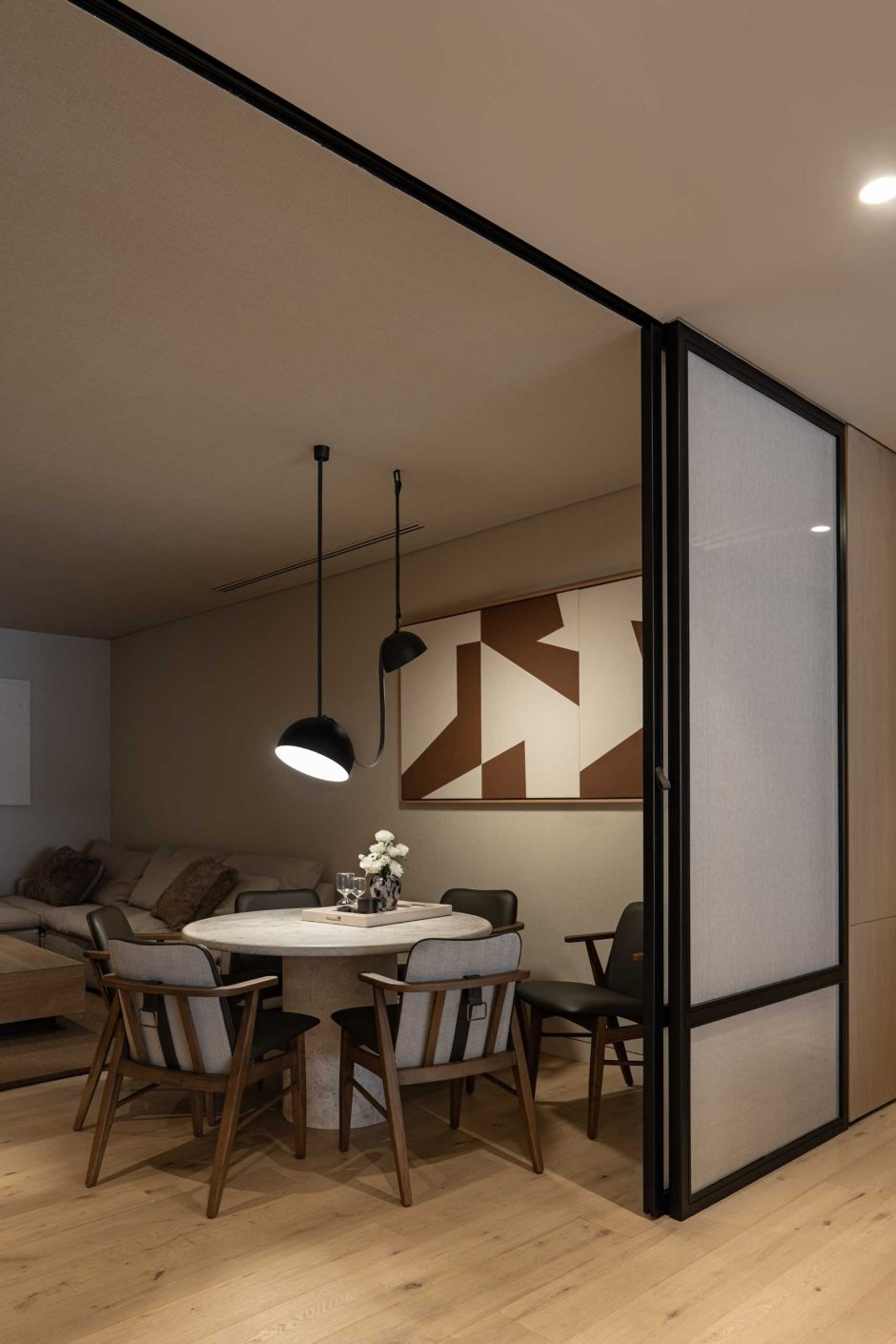 Hidden Lighting Creates A Warm Glow Throughout This Apartment Interior