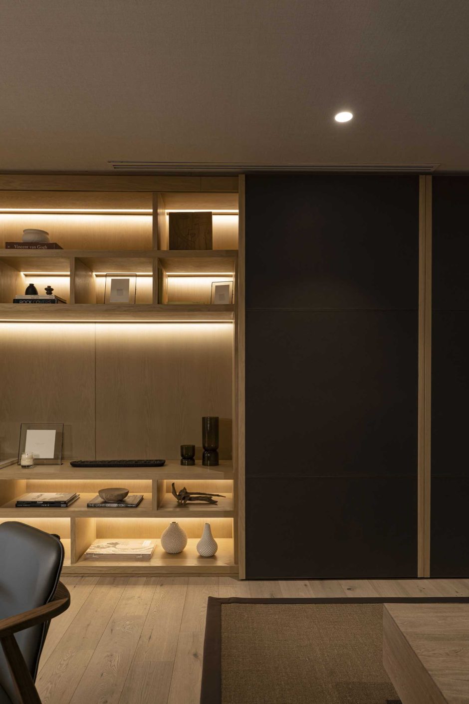 Hidden Lighting Creates A Warm Glow Throughout This Apartment Interior