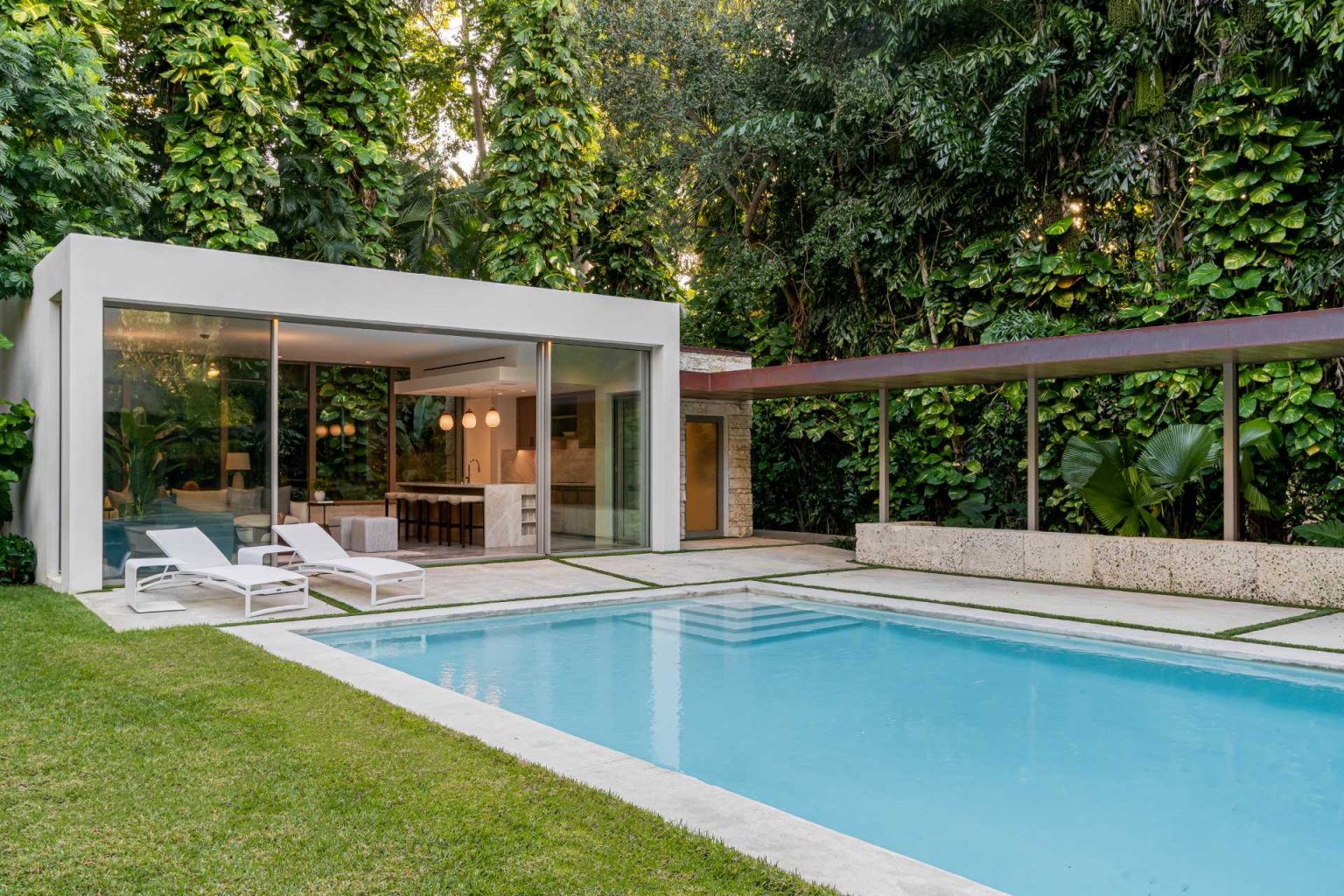A Pool House And Loggia Enhance This Lush Backyard Experience