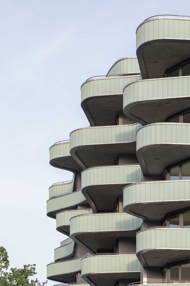 Undulating Balconies And A Mint Green Tiled Exterior Give This New ...