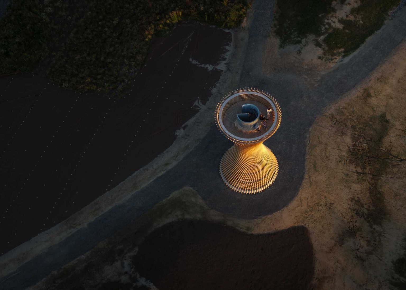 An Observation Tower That Looks Like Twisted Wood Rises Above The ...