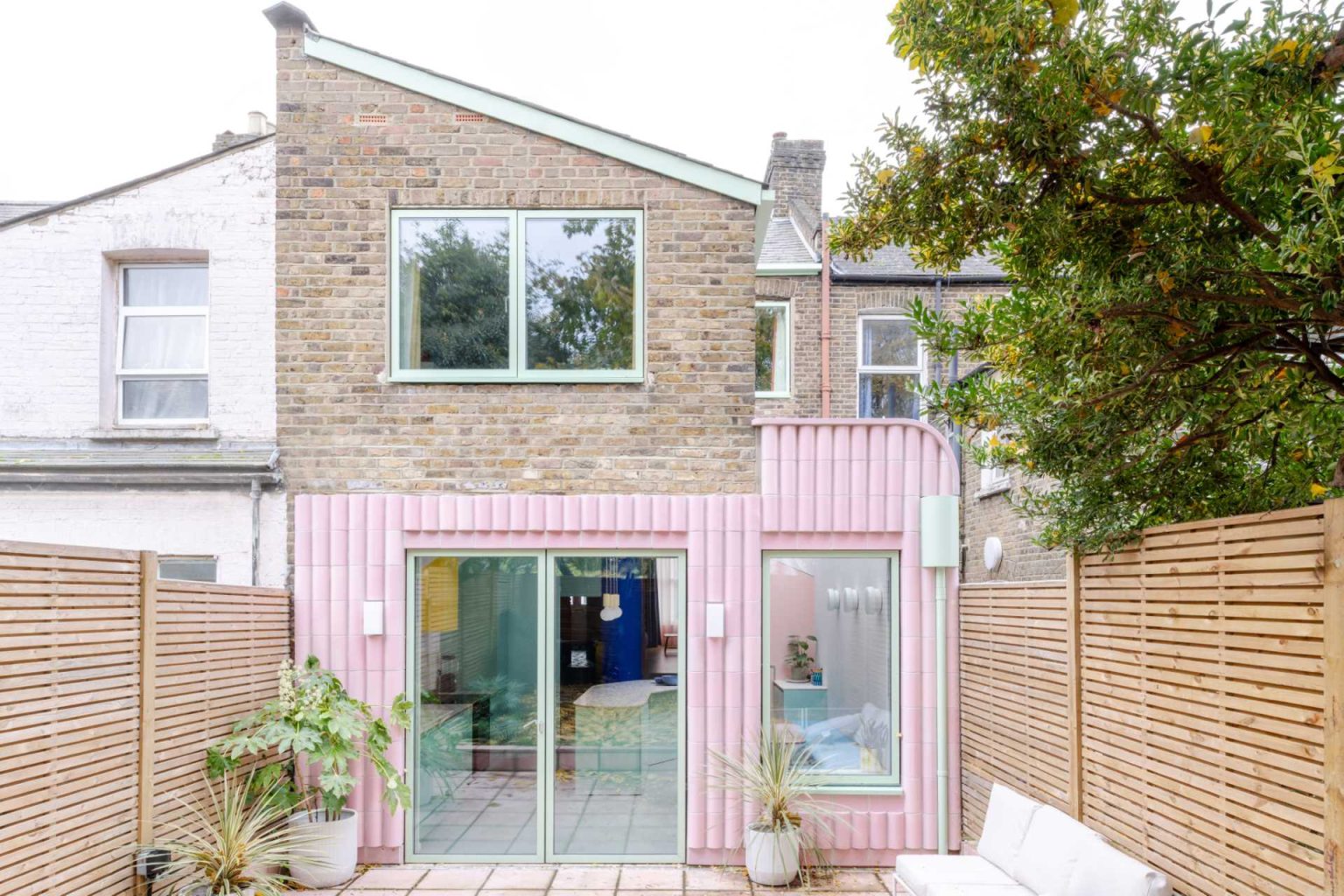 Glazed Pink Tiles Cover This New Home Addition