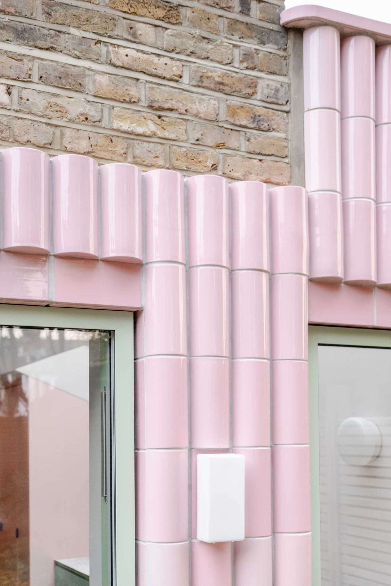 Glazed Pink Tiles Cover This New Home Addition