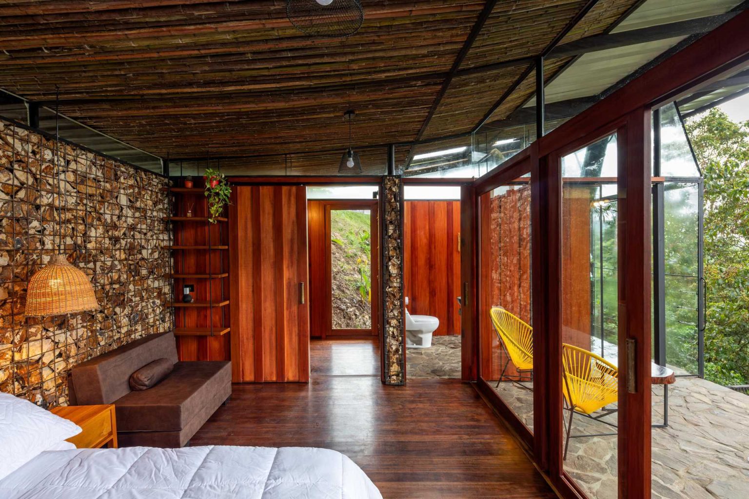 An Elevated Room Surrounded By Trees In The Jungle