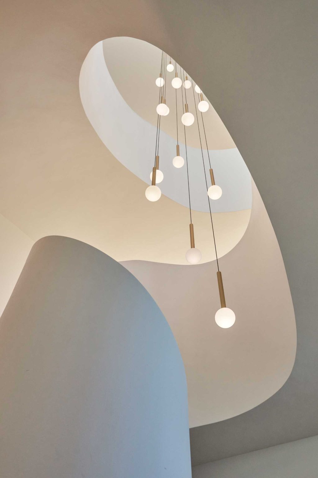 An Undulating Wood Ceiling Inspired By Ocean Waves And Nearby Mountains