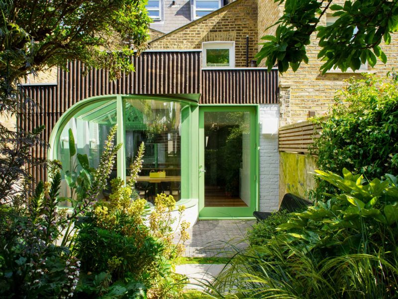 A House Extension With A Curved Window Makes Room For A New Kitchen At ...