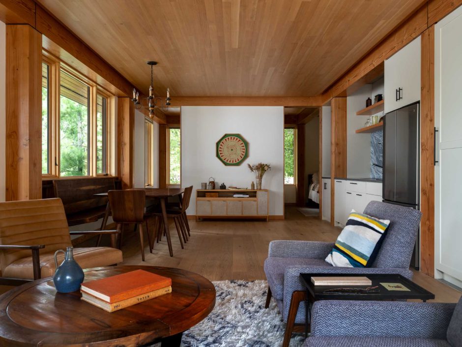 Exposed Wood Posts & Beams Add A Warm Rustic Touch To This Small Cabin ...