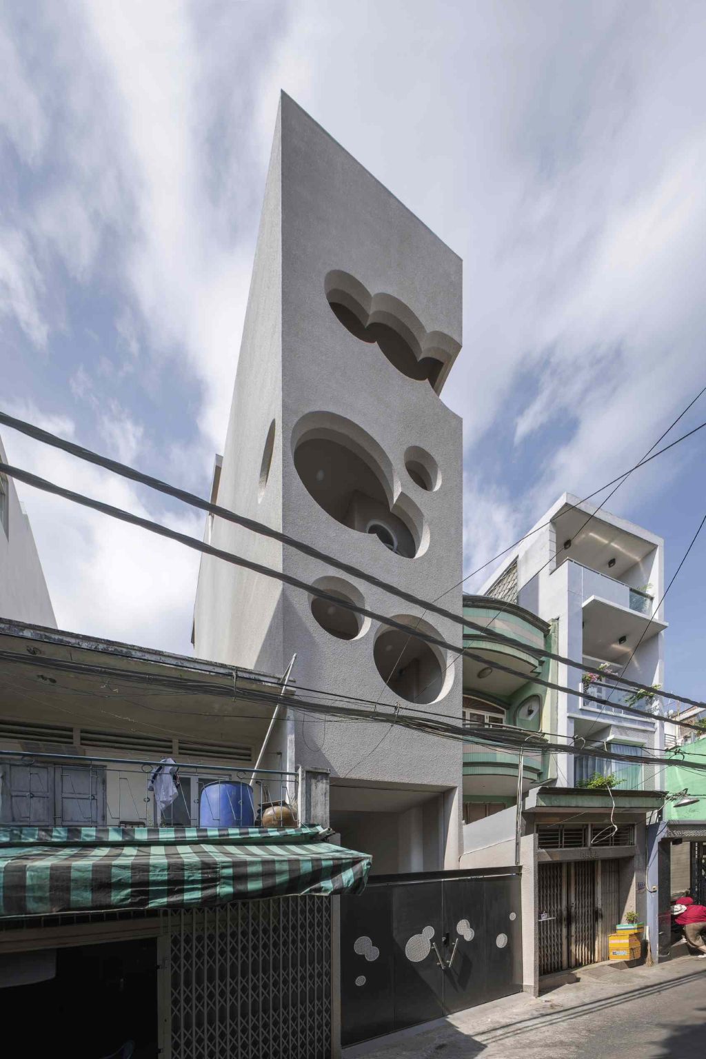 Peek Inside This Apartment Building With Cloud-Shaped Windows