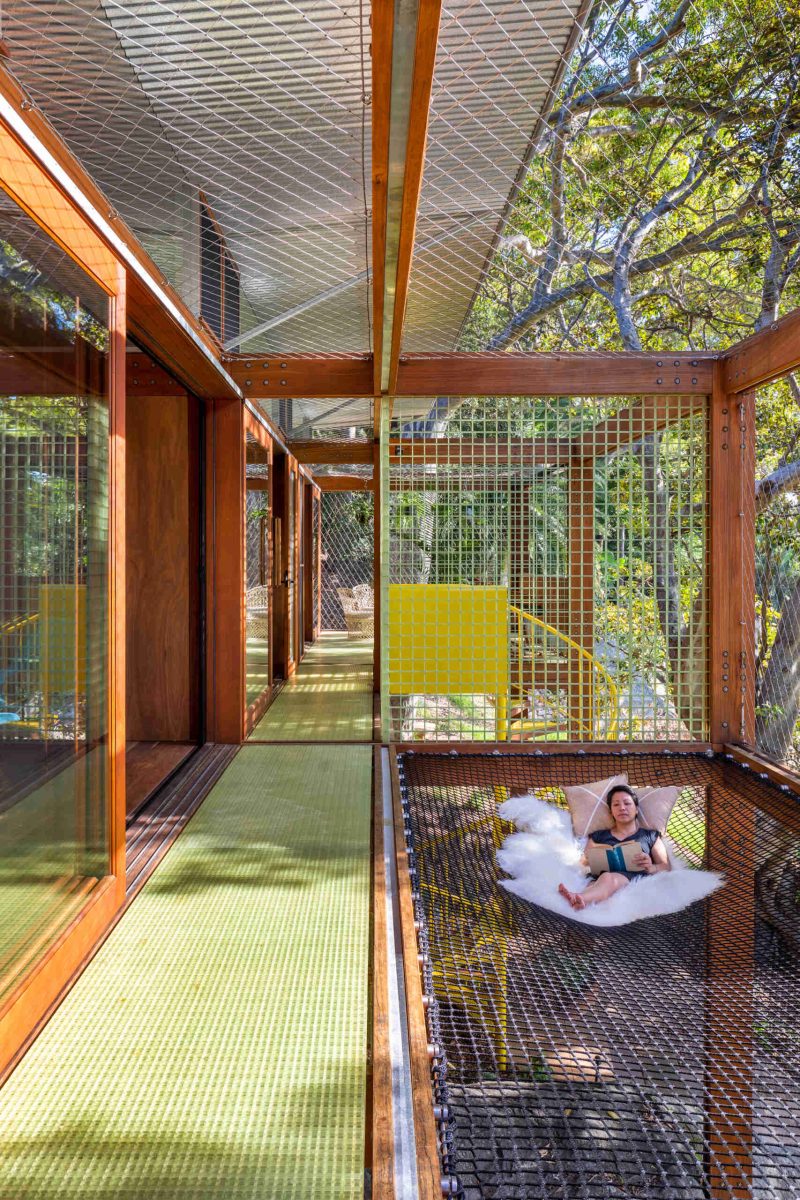 Above the Ground, Among the Leaves: A Modest Prefab Timber Home in the ...
