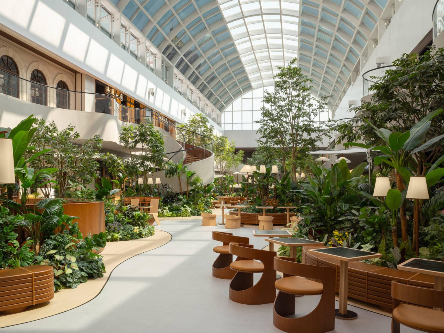 Step Inside This Indoor Garden Dining Plaza Filled With Plants And Pathways