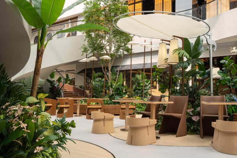 Step Inside This Indoor Garden Dining Plaza Filled With Plants And Pathways