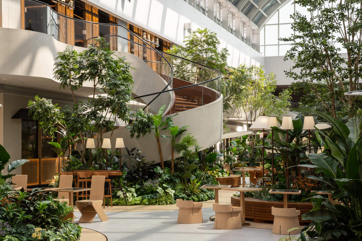 Step Inside This Indoor Garden Dining Plaza Filled With Plants And Pathways