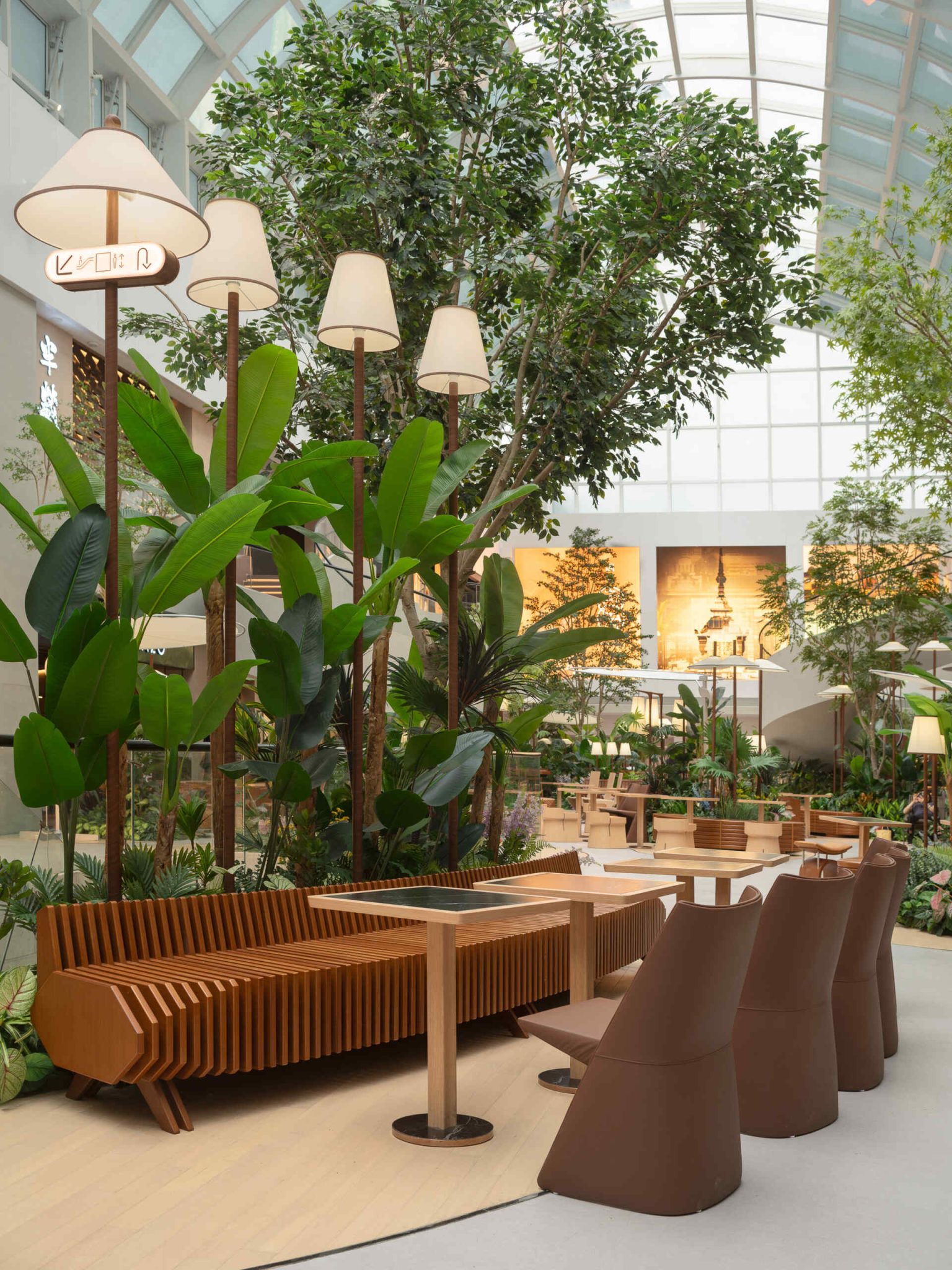 Step Inside This Indoor Garden Dining Plaza Filled With Plants And Pathways
