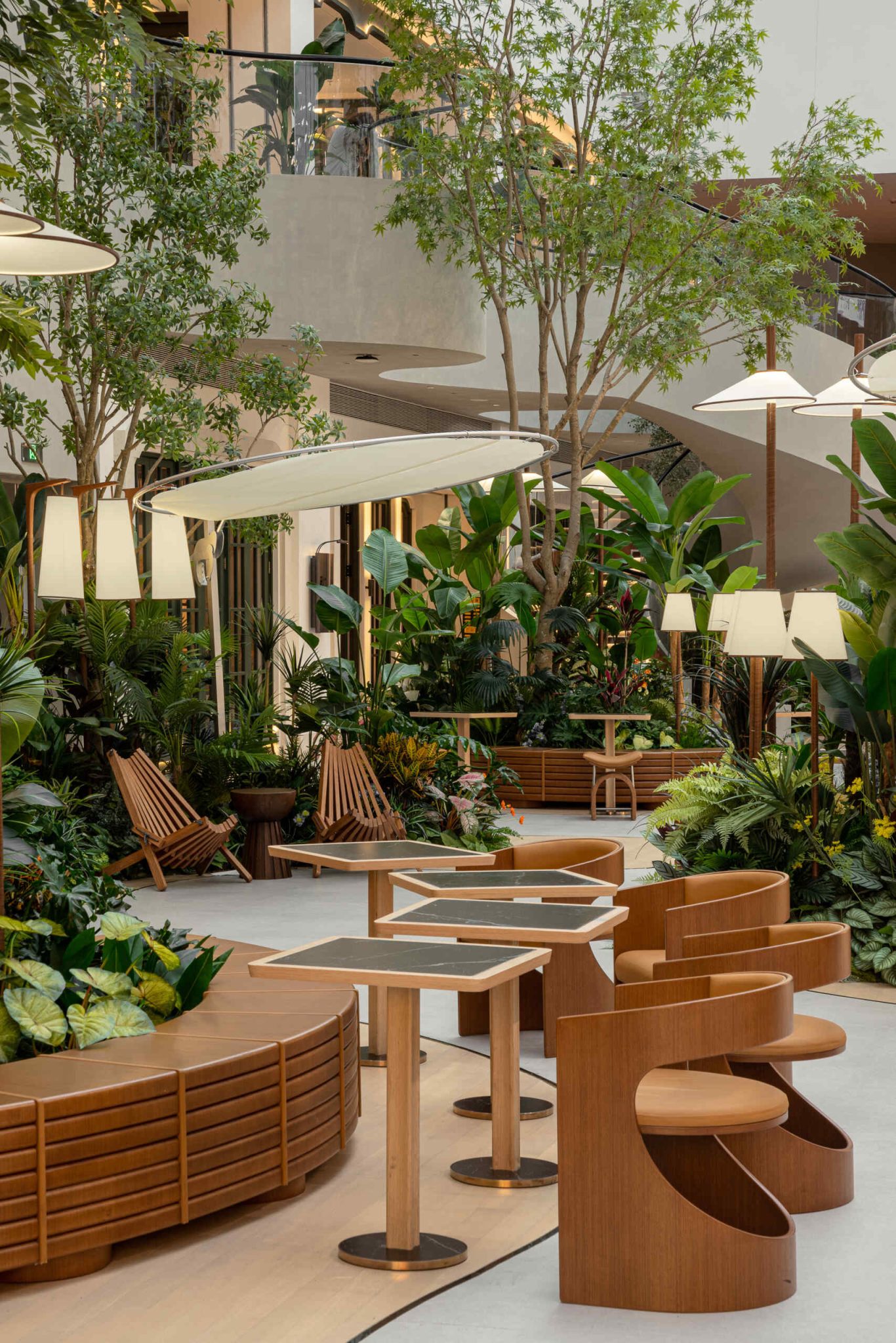 Step Inside This Indoor Garden Dining Plaza Filled With Plants And Pathways
