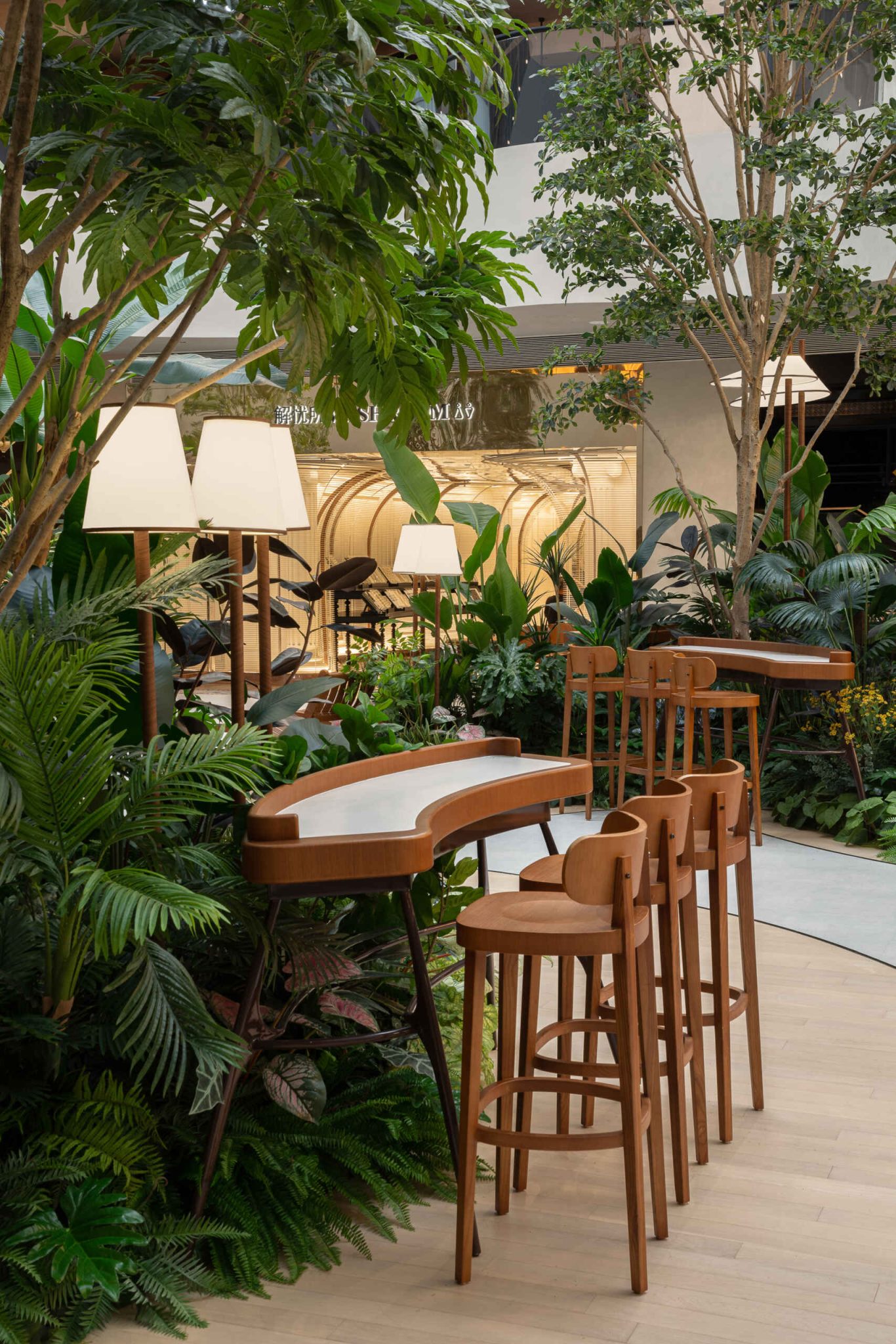 Step Inside This Indoor Garden Dining Plaza Filled With Plants And Pathways
