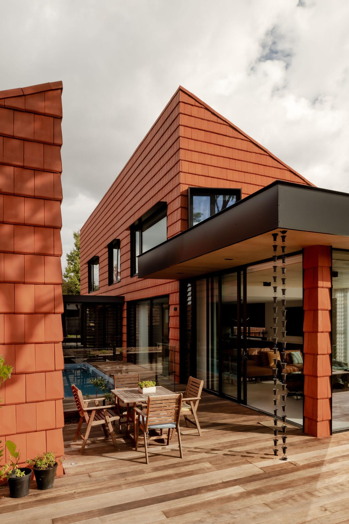 How Terracotta Shingles Bring Earthy Warmth To This Modern Home