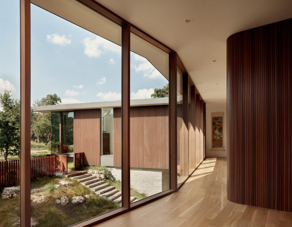 A bridge entry sets up the big reveal inside this home