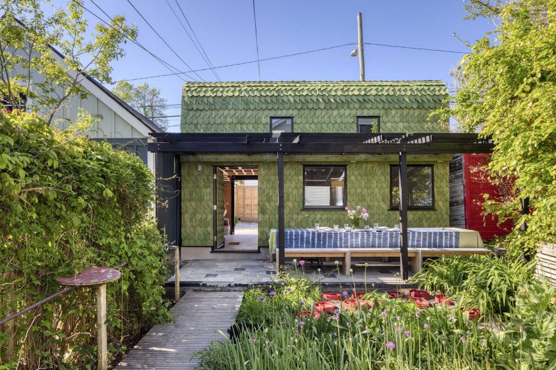 Dragon-Inspired Wood Shingles Cover This Laneway Garage