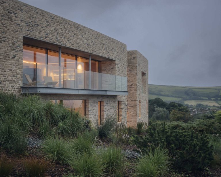 Inside A Stone House That Follows the Land