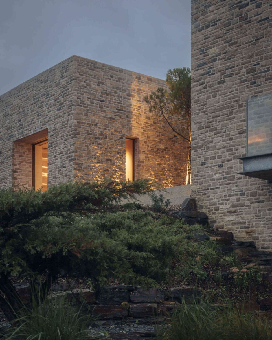 Inside A Stone House That Follows the Land