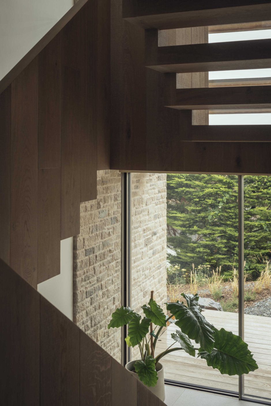 Inside A Stone House That Follows the Land