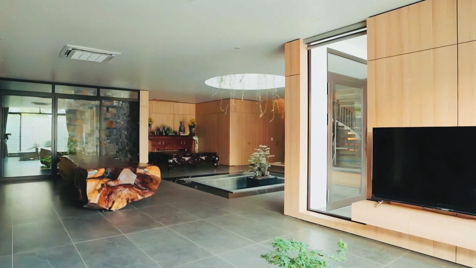 The Koi Pond and Hanging Garden That Becomes the Heart of Daily Living