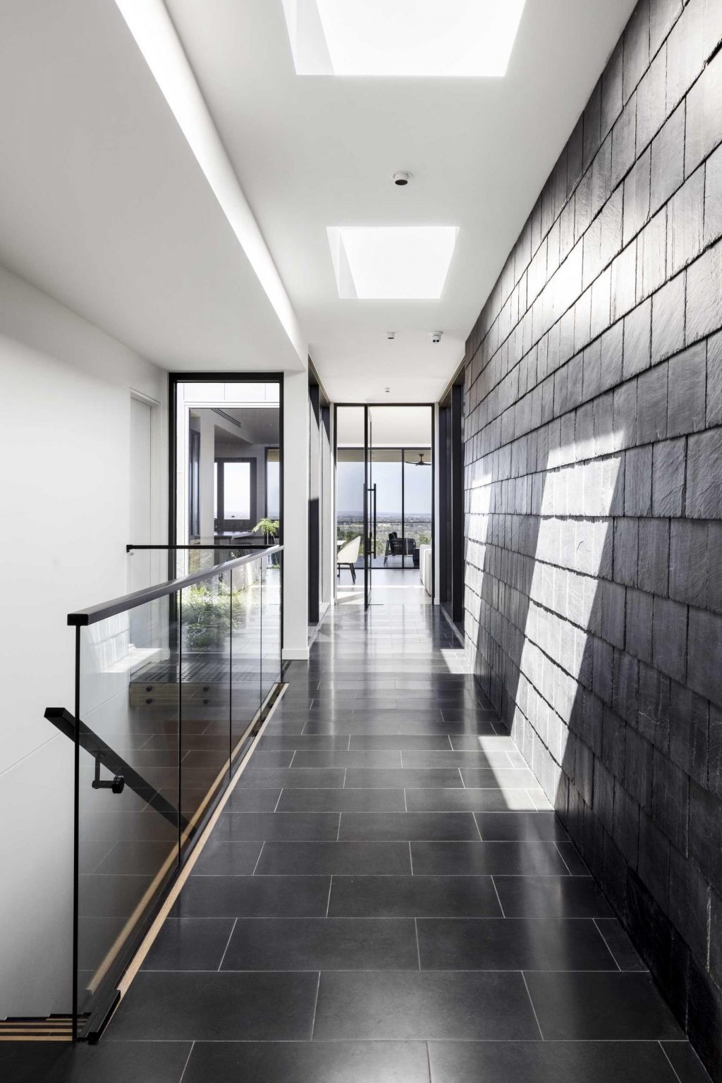 A Slate-Clad House That Blends Warm Timber and Modern Design